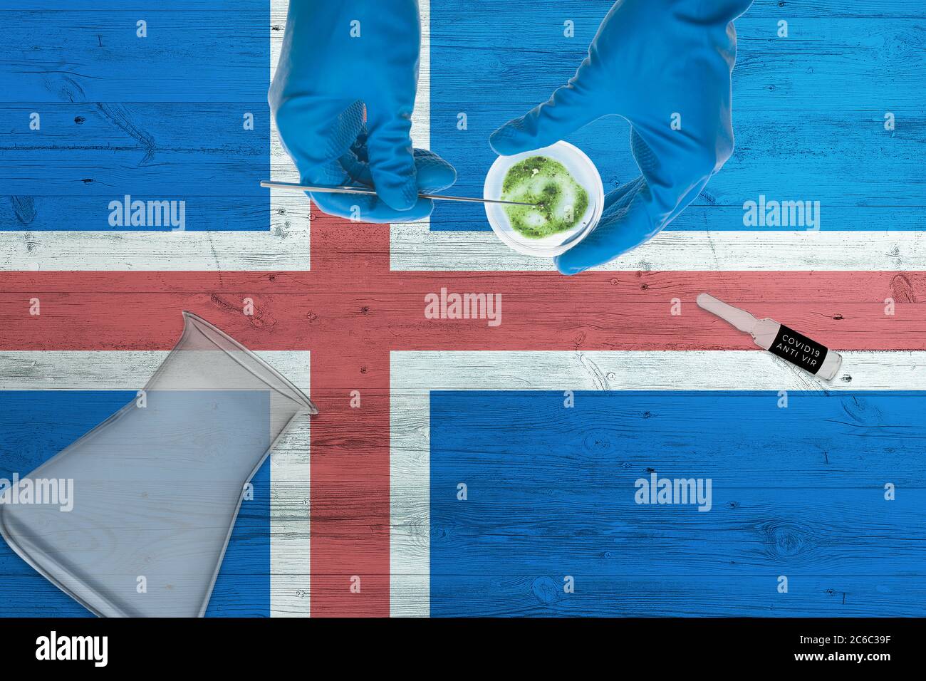 Iceland flag on laboratory table. Medical healthcare technologist ...