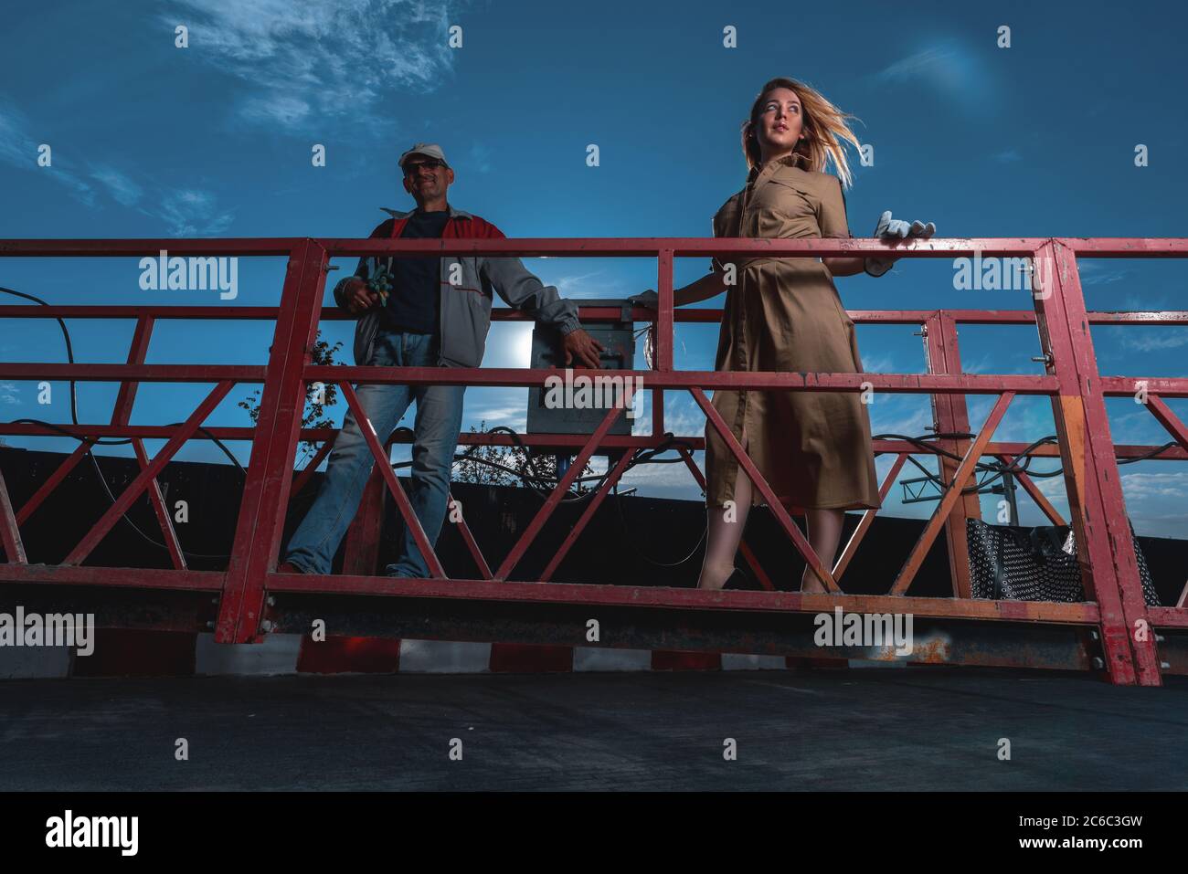 Attractive Glamorous Woman In Stylish Dress At Construction Cradle Near ...