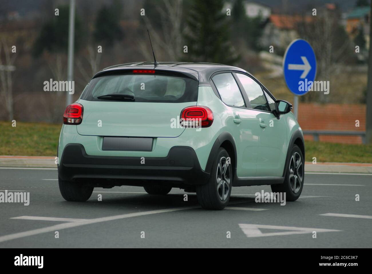 Driving too fast. Car going at high speed cornering, rear view Stock ...