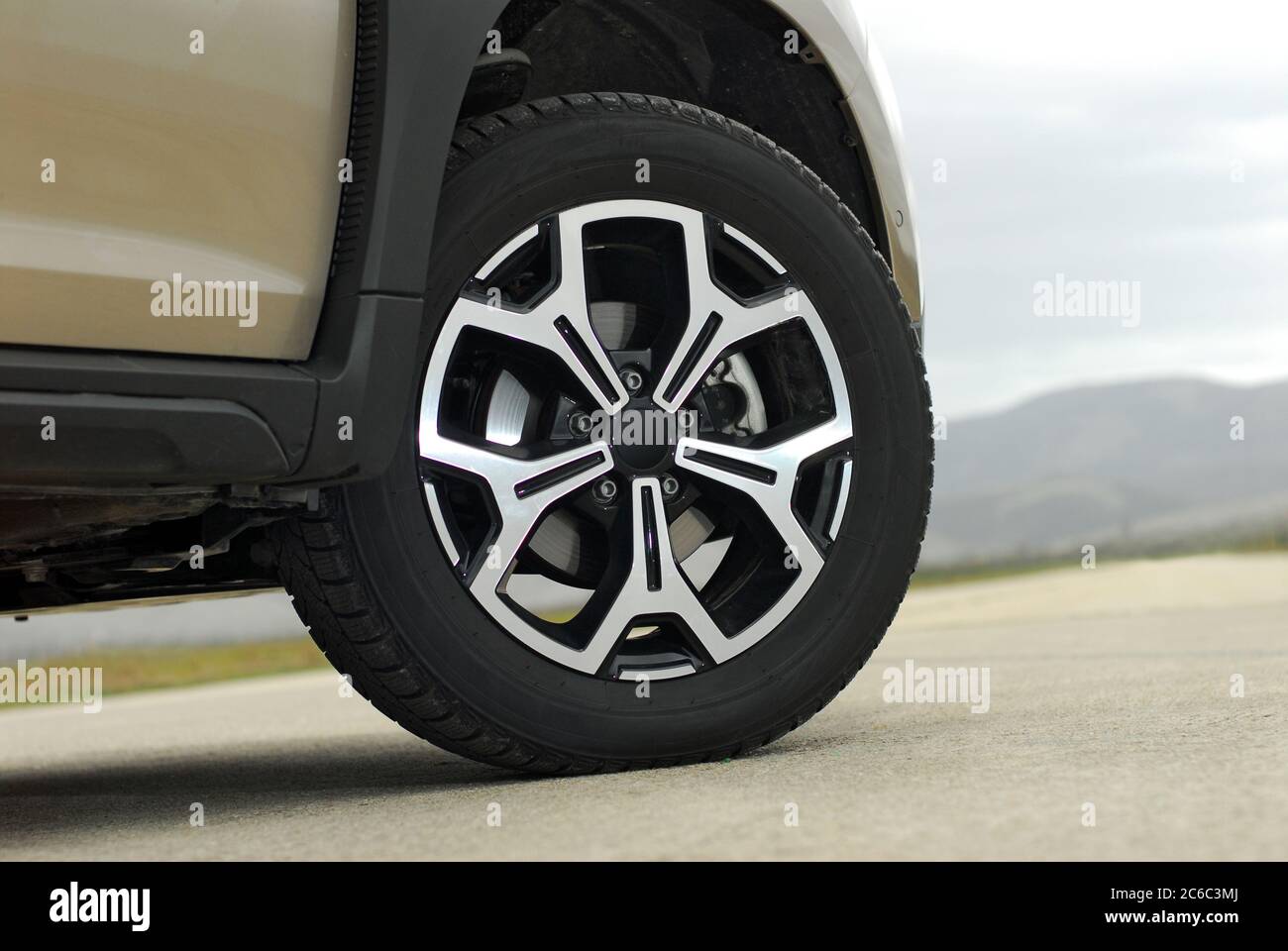 tire and alloy wheel on this passenger car Stock Photo - Alamy