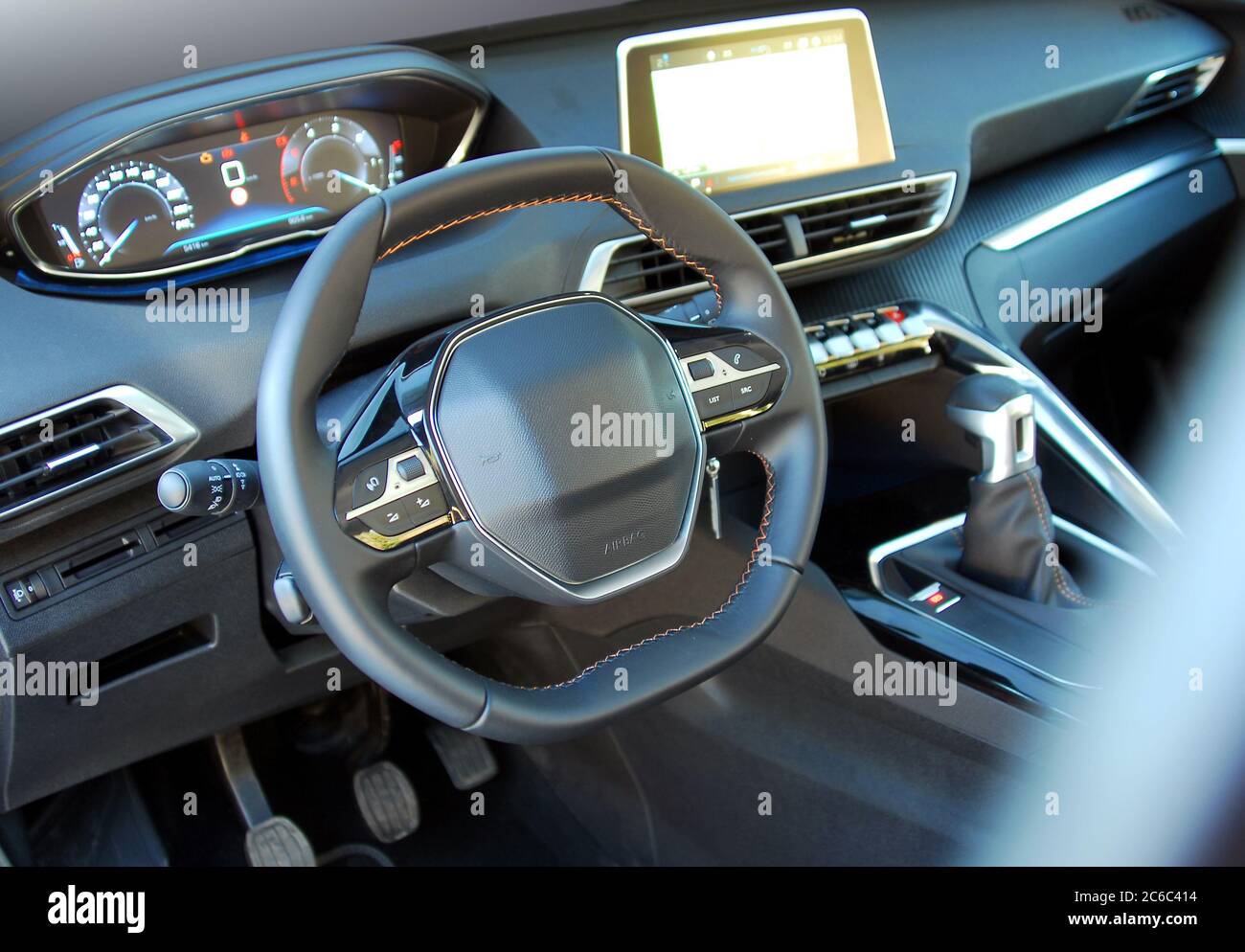 Steering wheel in the new modern car Stock Photo - Alamy
