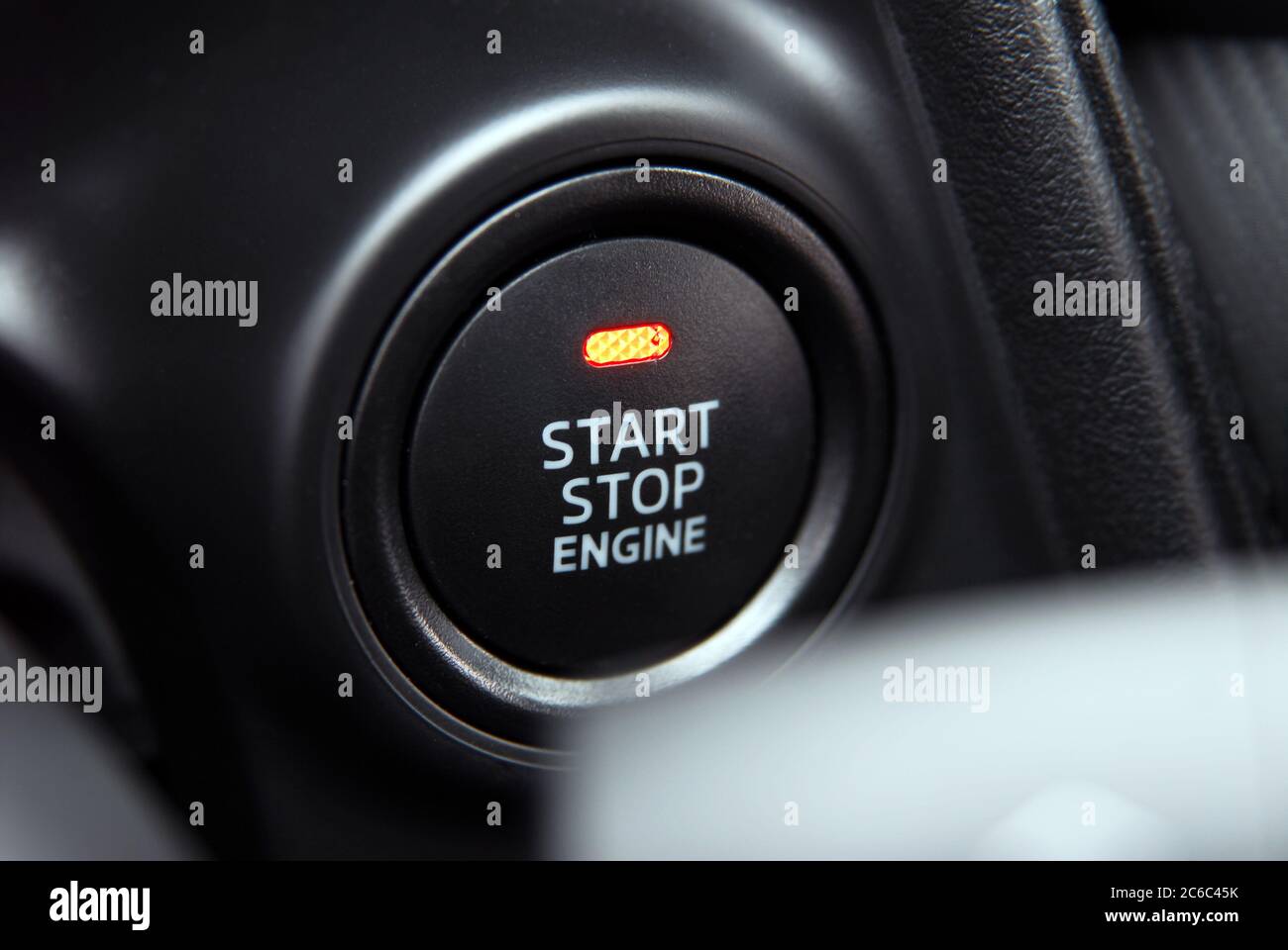 Start stop engine button on a modern car dashboard Stock Photo - Alamy