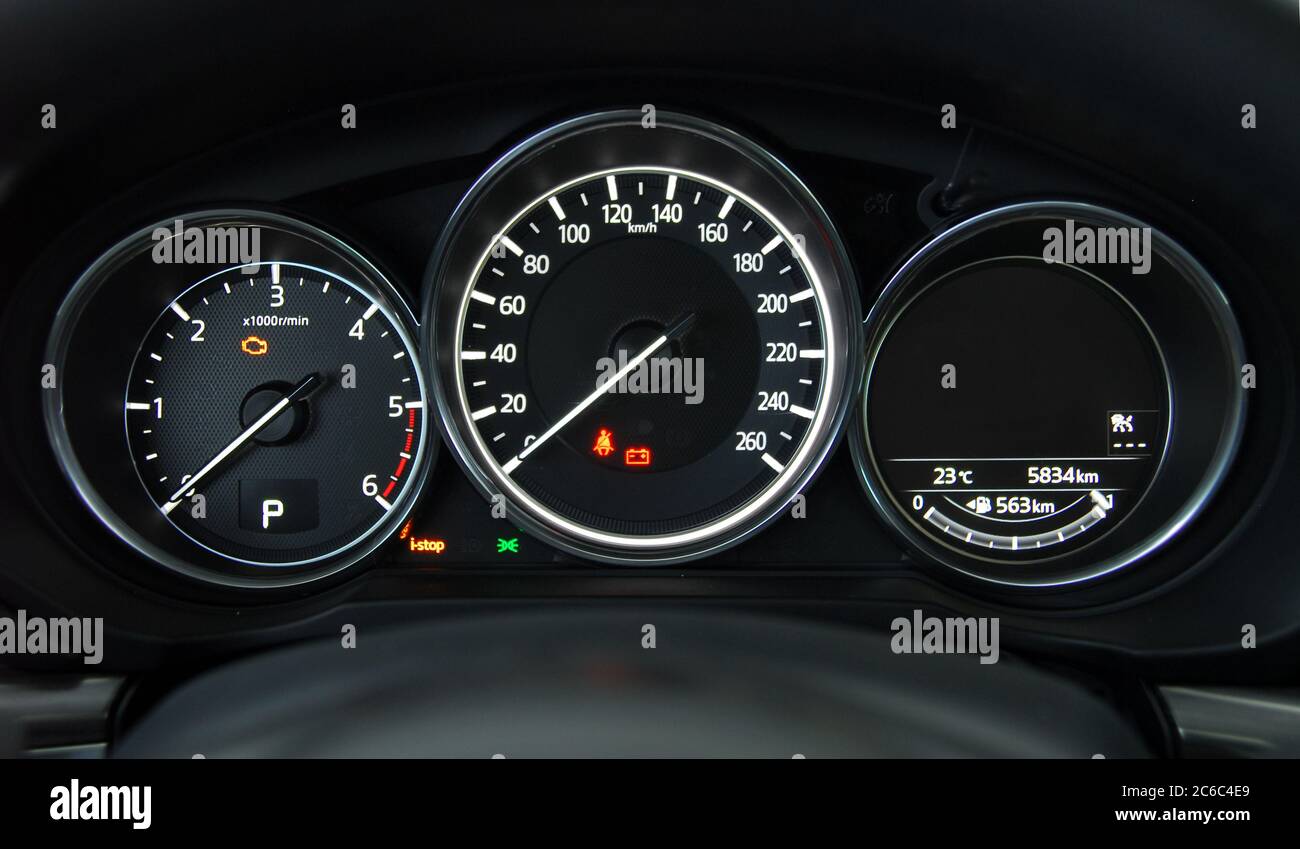 Illuminated instrument panel with the passenger car. Car dashboard ...
