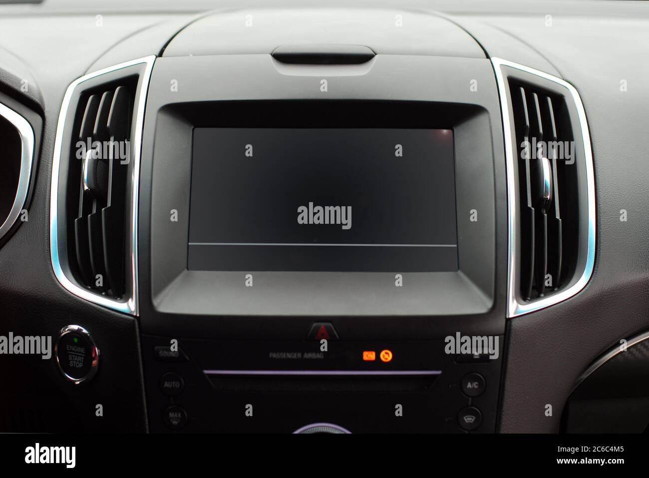 Screen multimedia system on dashboard in a modern car Stock Photo - Alamy