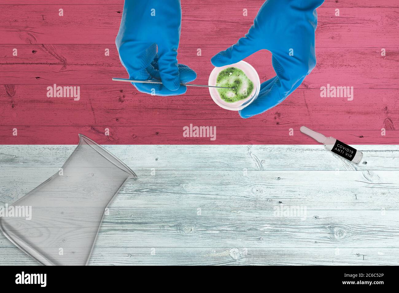 Monaco flag on laboratory table. Medical healthcare technologist ...