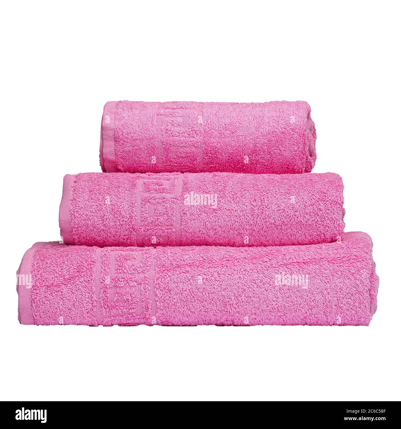 3 frotte towels pink color, bedroom towel white backgroung. Colorful ...
