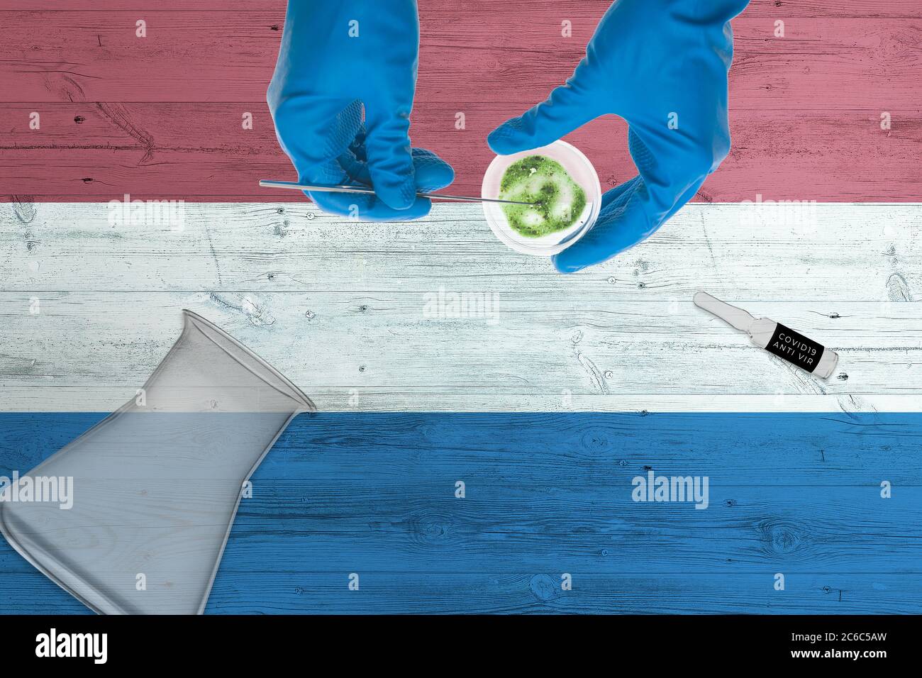 Netherlands flag on laboratory table. Medical healthcare technologist ...