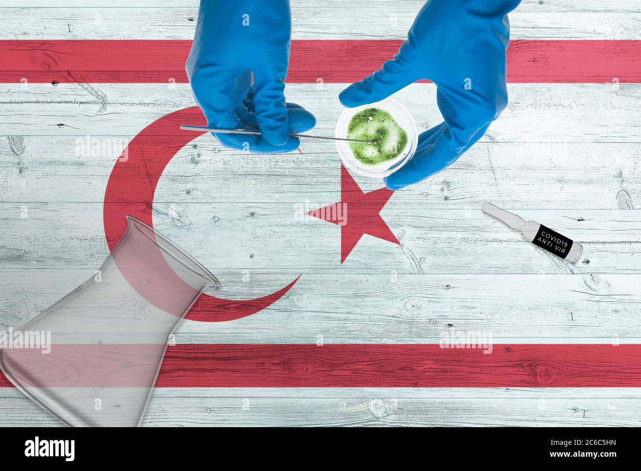 Northern Cyprus flag on laboratory table. Medical healthcare ...