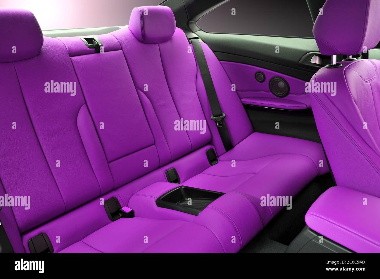 the pink rear seat of a luxury passenger car Stock Photo - Alamy