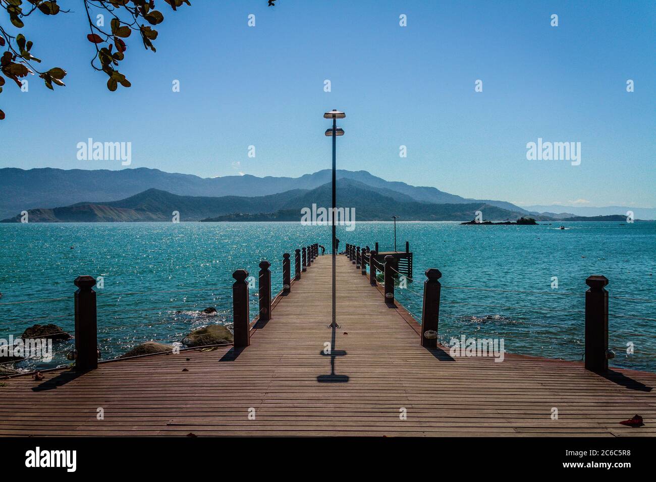 Pier in the sea of the Brazilian island in Ilhabela, São Paulo, Brazil ...