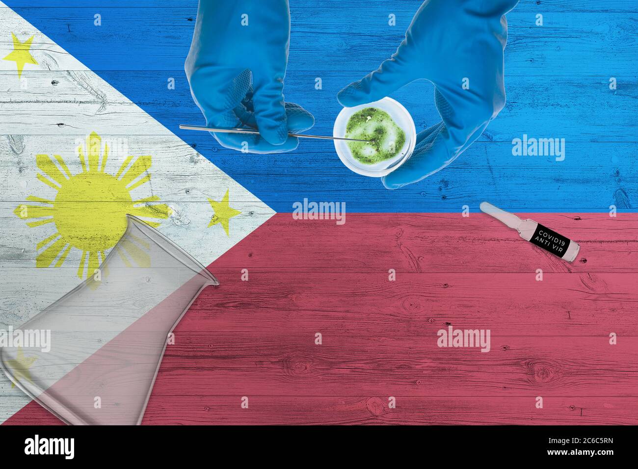 Philippines flag on laboratory table. Medical healthcare technologist ...