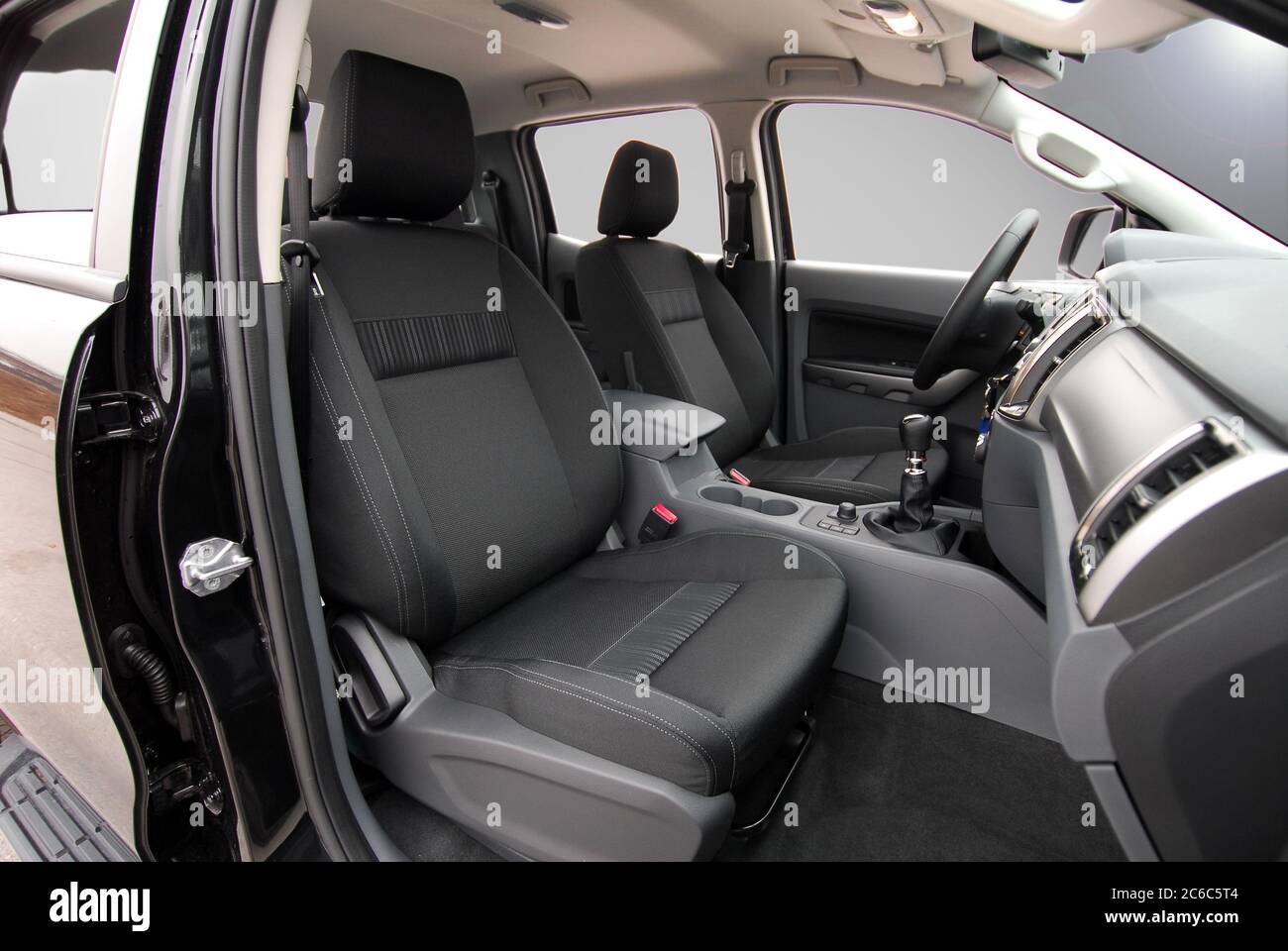 Front car seats. Front seats of a modern passenger car Stock Photo - Alamy