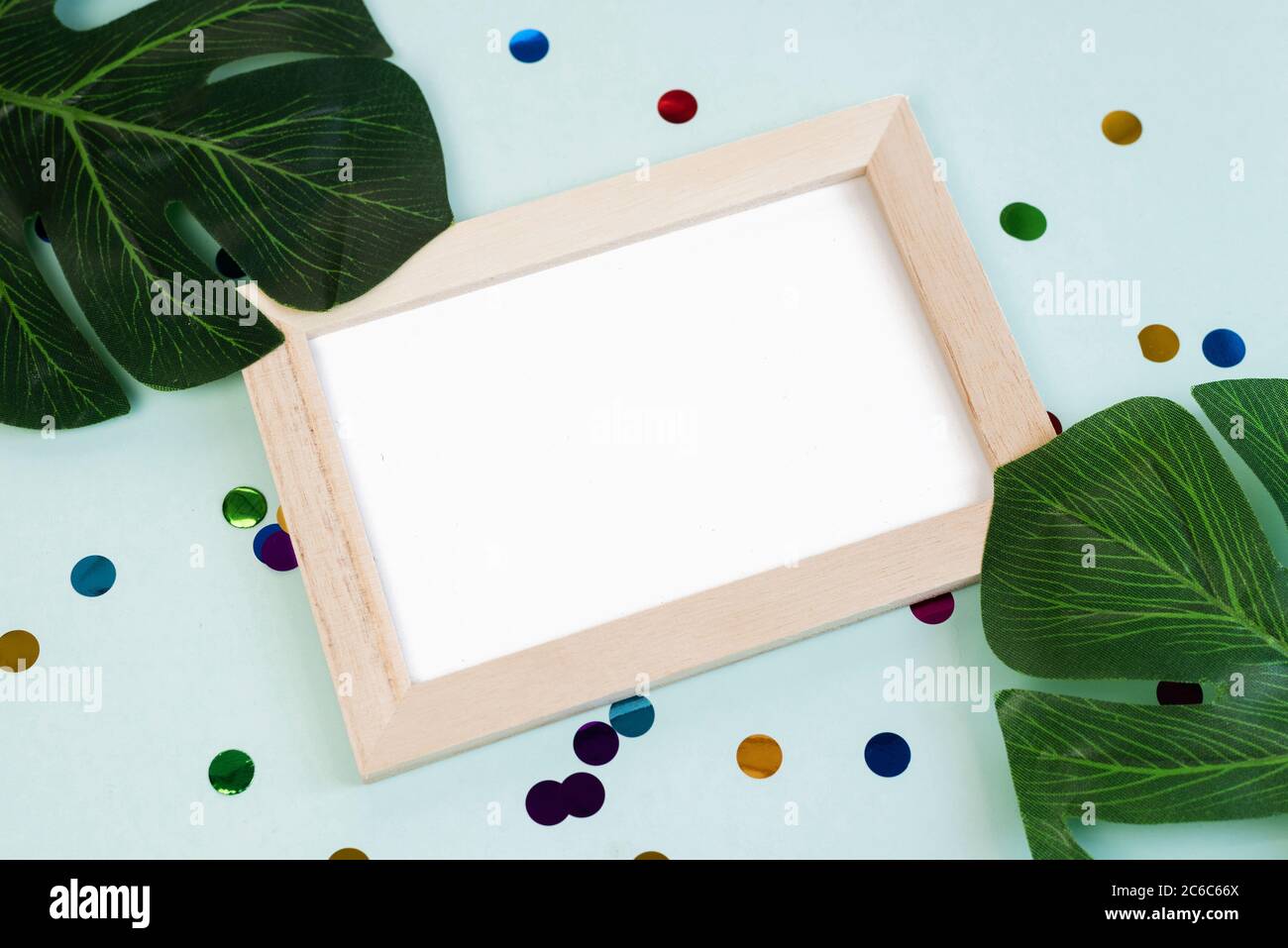Photo frame with empty place for text or advertisement on a blue ...