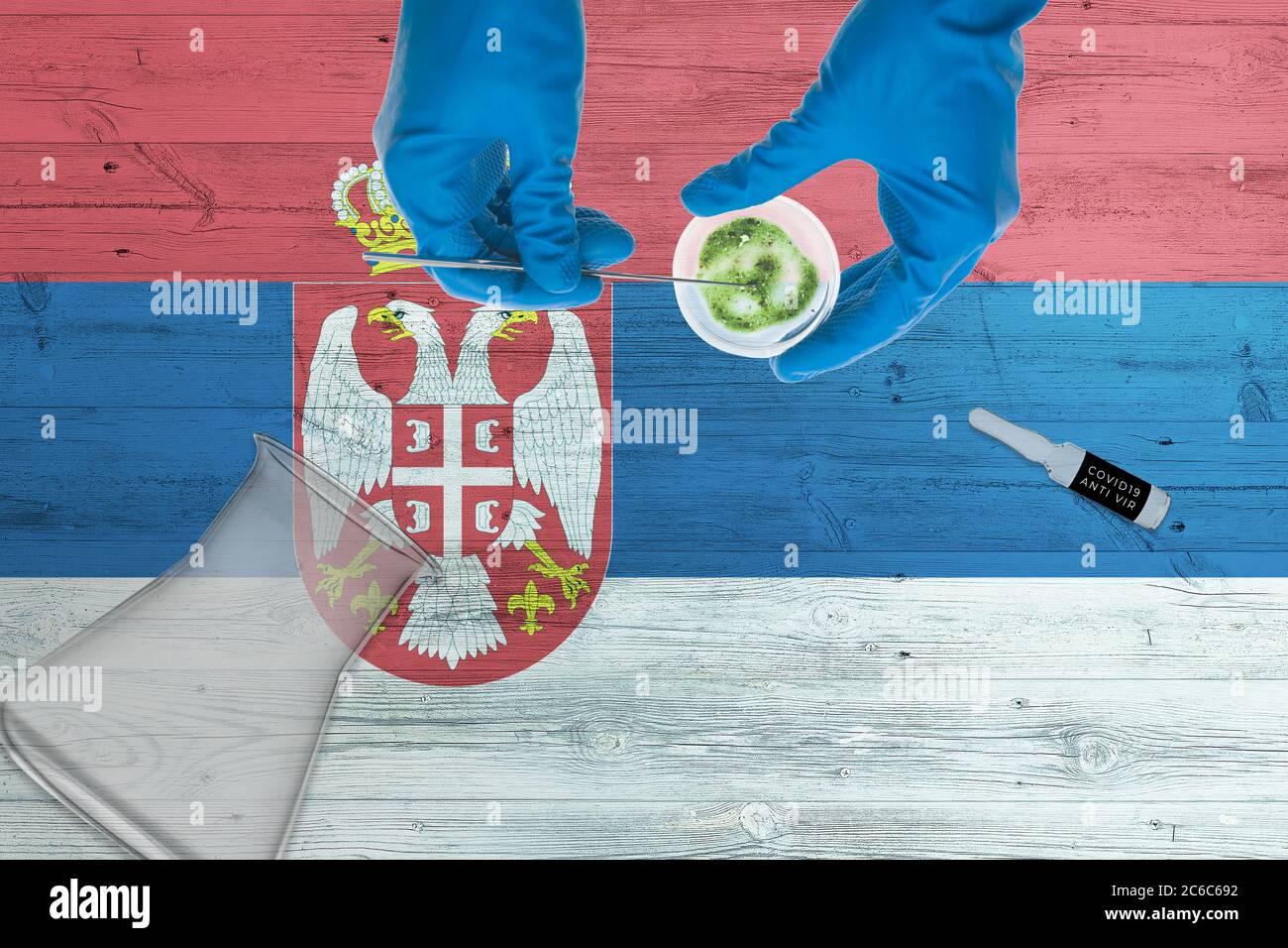 Serbia flag on laboratory table. Medical healthcare technologist ...