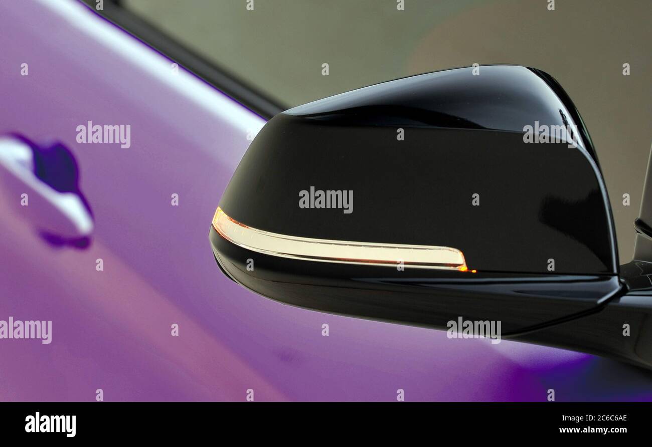 Side mirror with turn signal of a car Stock Photo - Alamy