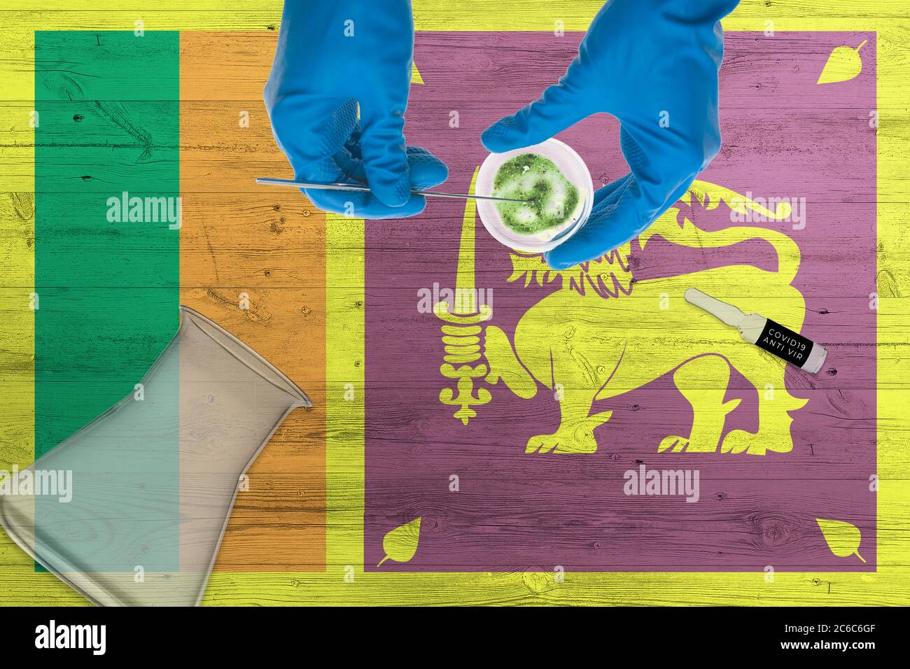 Sri Lanka flag on laboratory table. Medical healthcare technologist ...