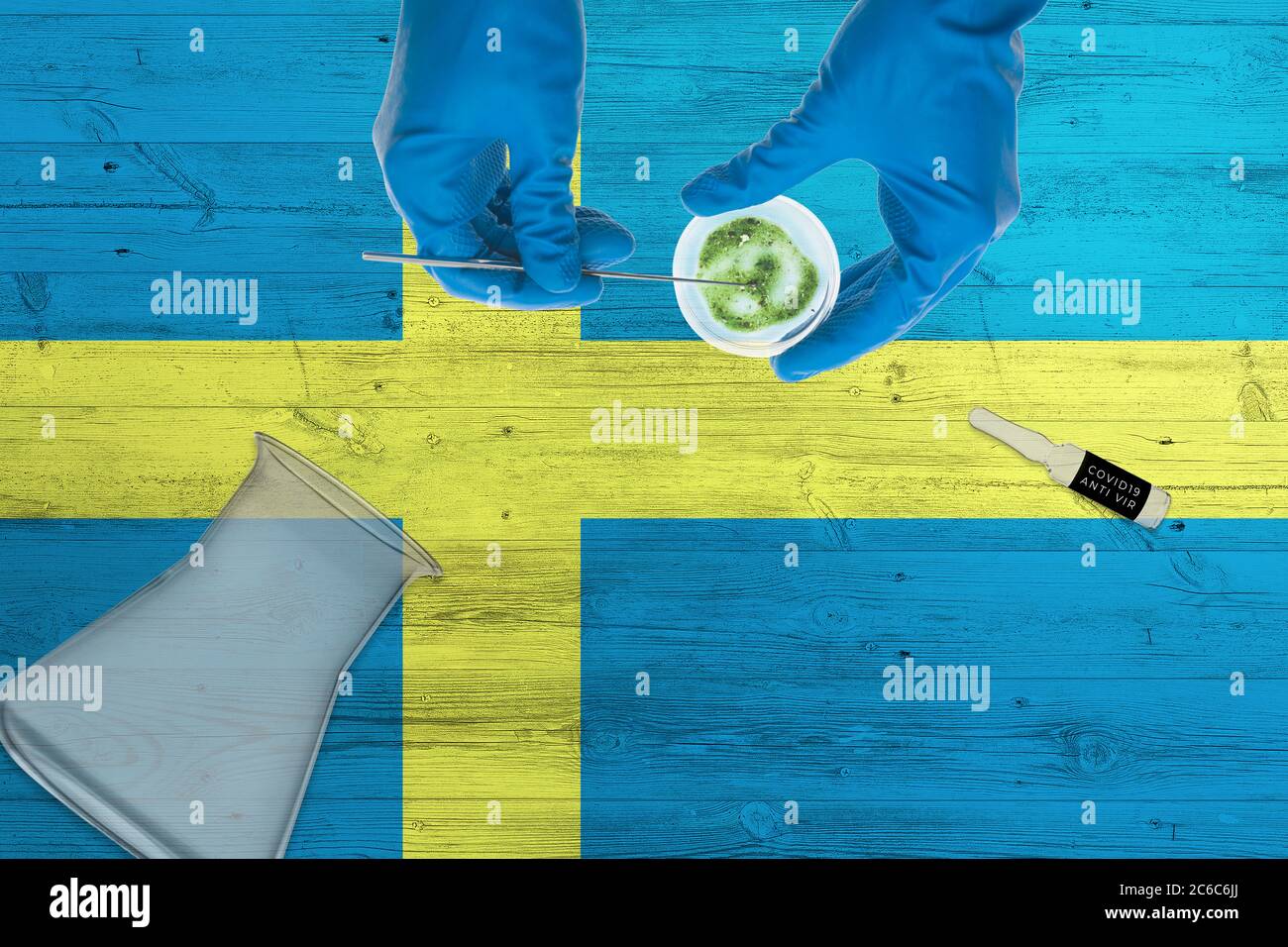 Sweden flag on laboratory table. Medical healthcare technologist ...