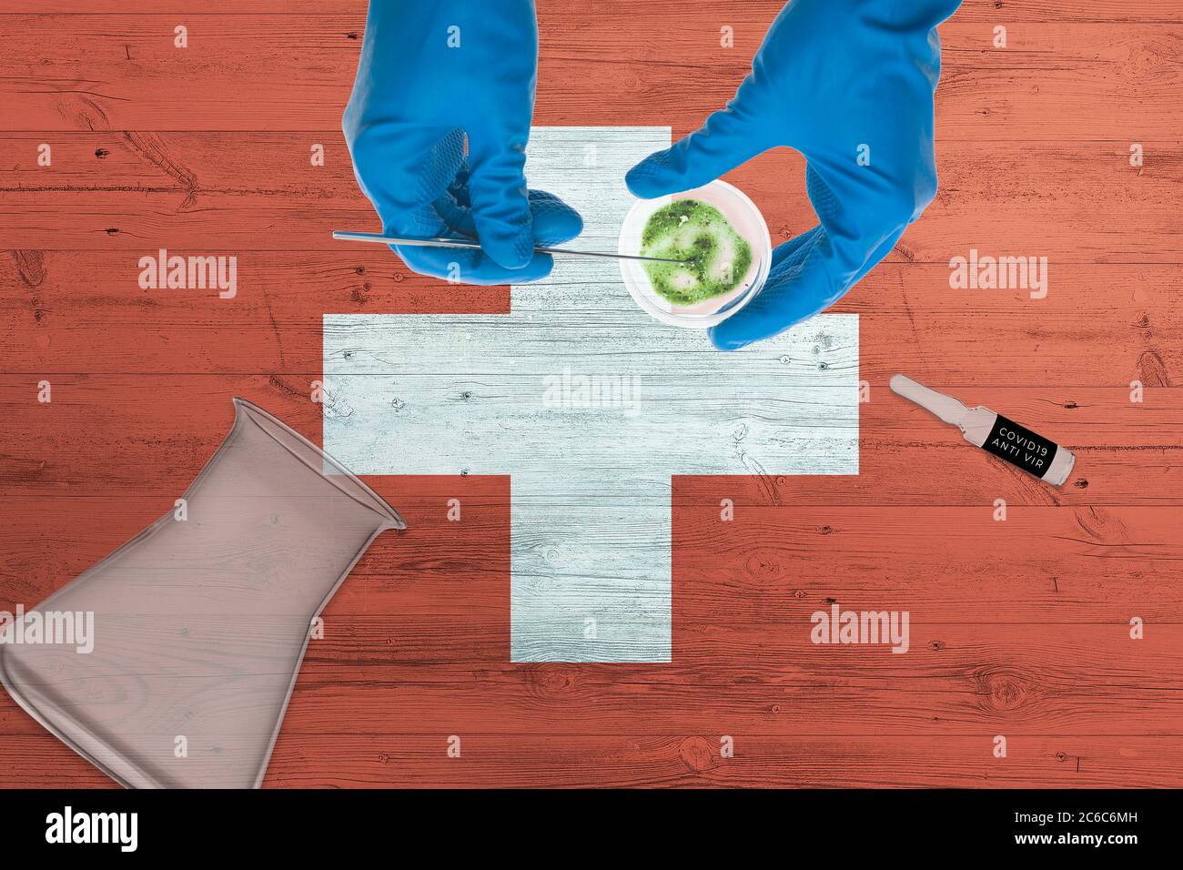 Switzerland flag on laboratory table. Medical healthcare technologist ...