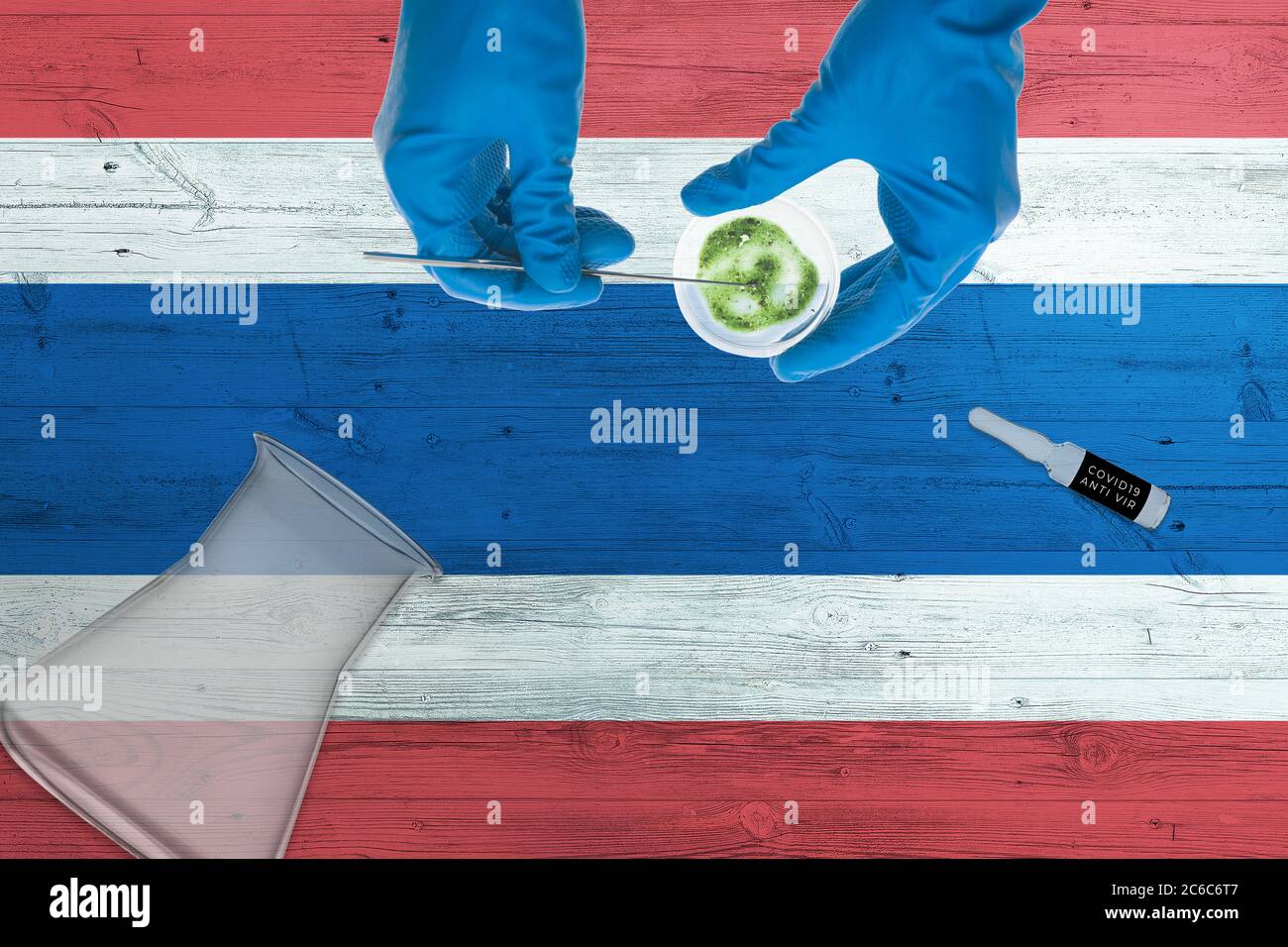 Thailand flag on laboratory table. Medical healthcare technologist ...