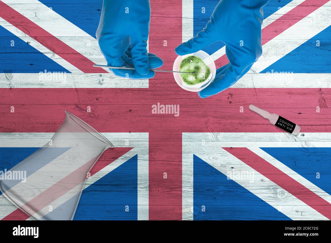 United Kingdom flag on laboratory table. Medical healthcare ...