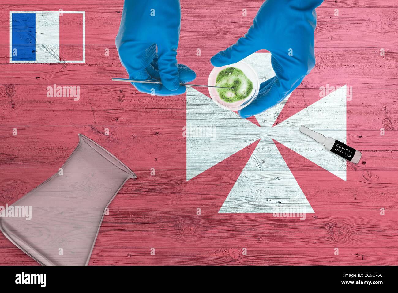 Wallis And Futuna flag on laboratory table. Medical healthcare ...