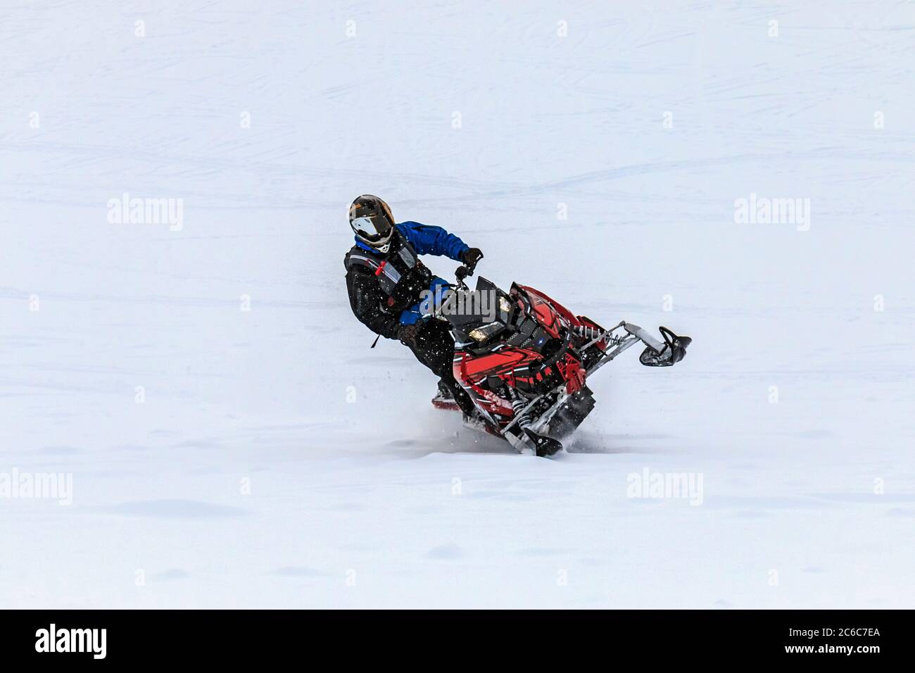 Having fun while snowmobiling in the Purcell Mountains near Golden, BC ...