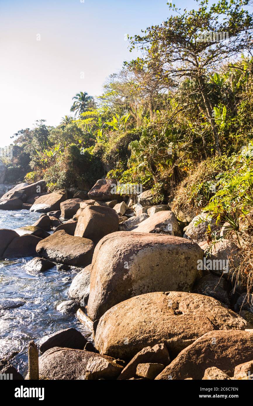 Stones on the Brazilian tropical coast in Ilhabela, São Paulo, Brazil ...
