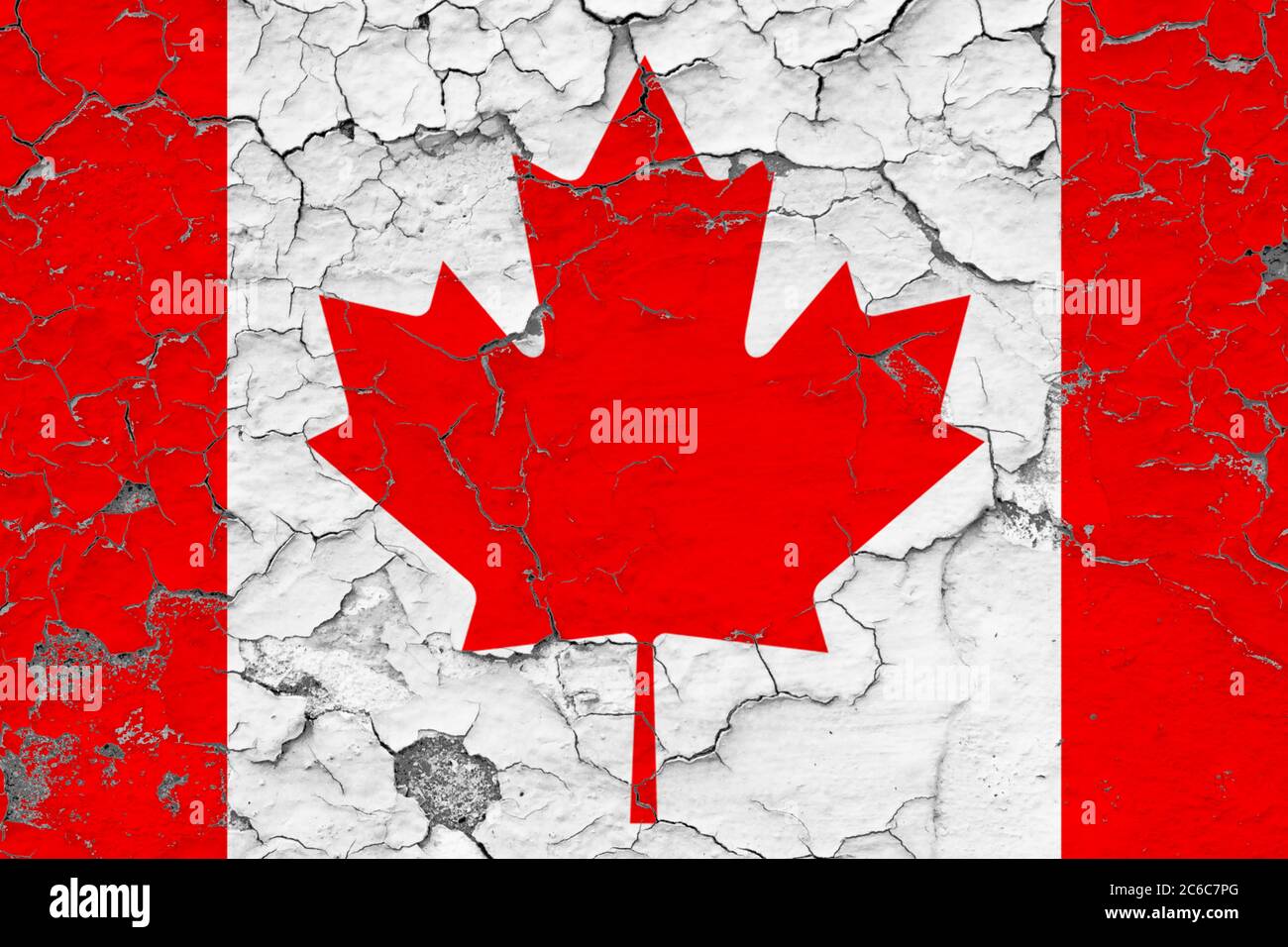 Canada flag close up grungy, damaged and weathered on wall peeling off ...