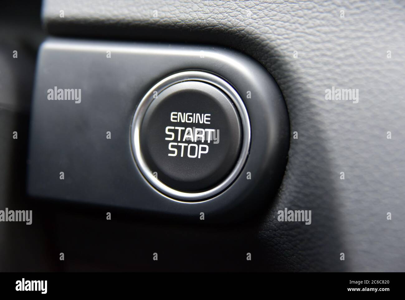 Start engine button. Start stop engine button on a modern car dashboard ...