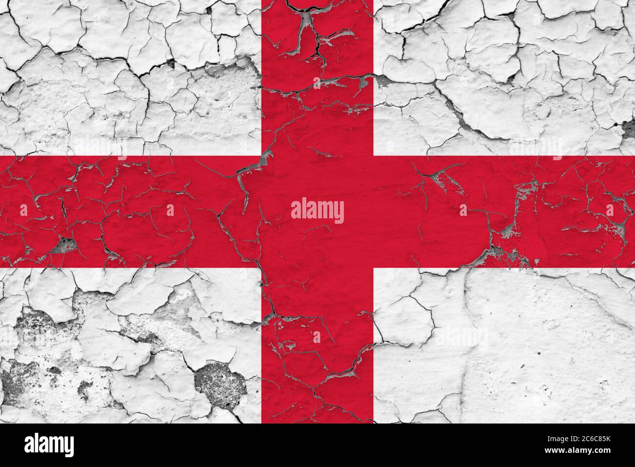 England flag close up grungy, damaged and weathered on wall peeling off ...