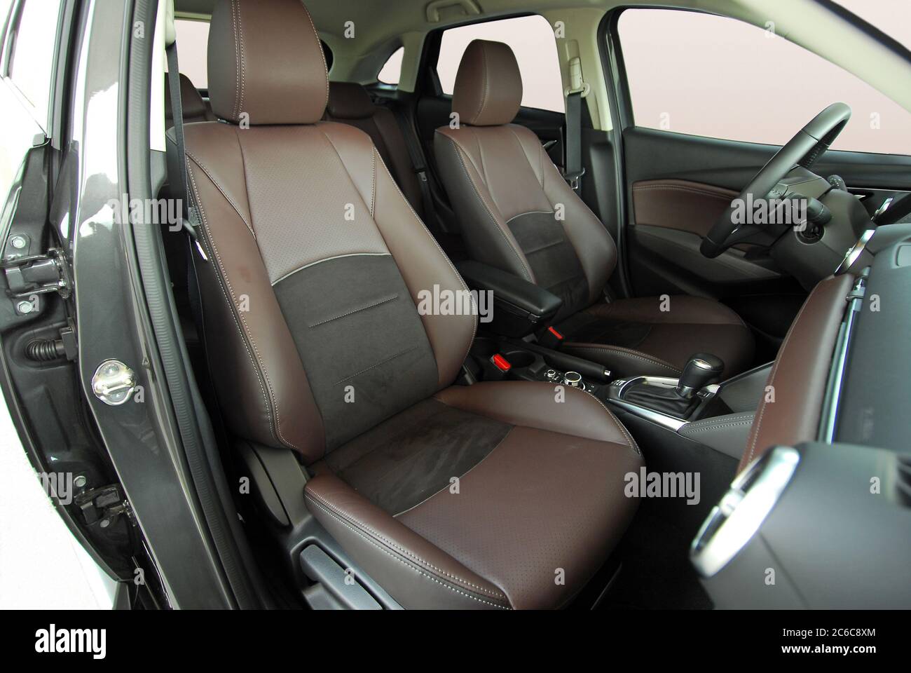 Front car seats. Front seats of a modern passenger car Stock Photo - Alamy