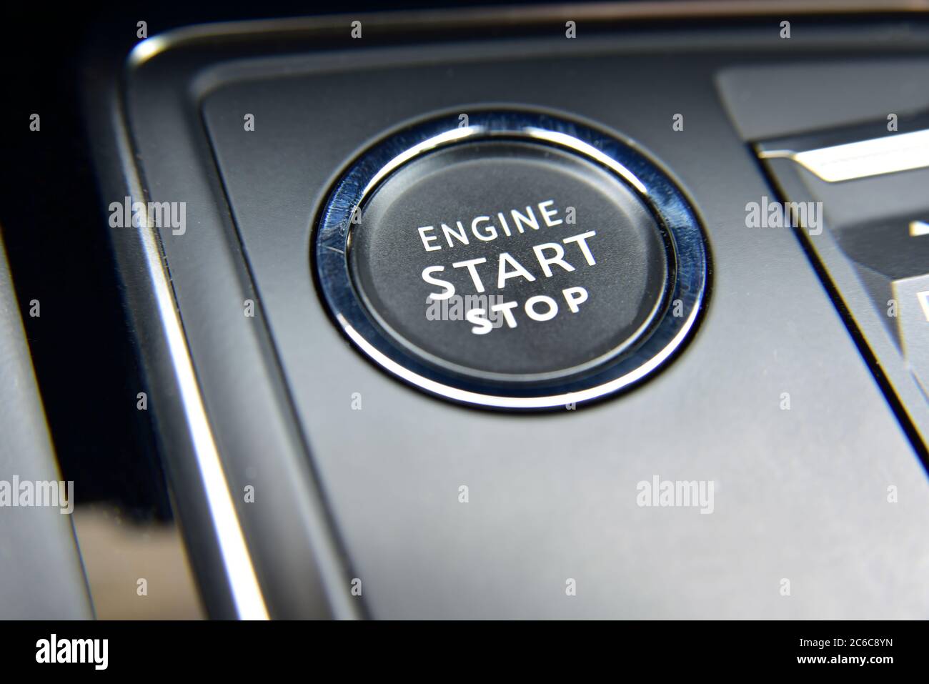 Start engine button. Start stop engine button on a modern car dashboard ...