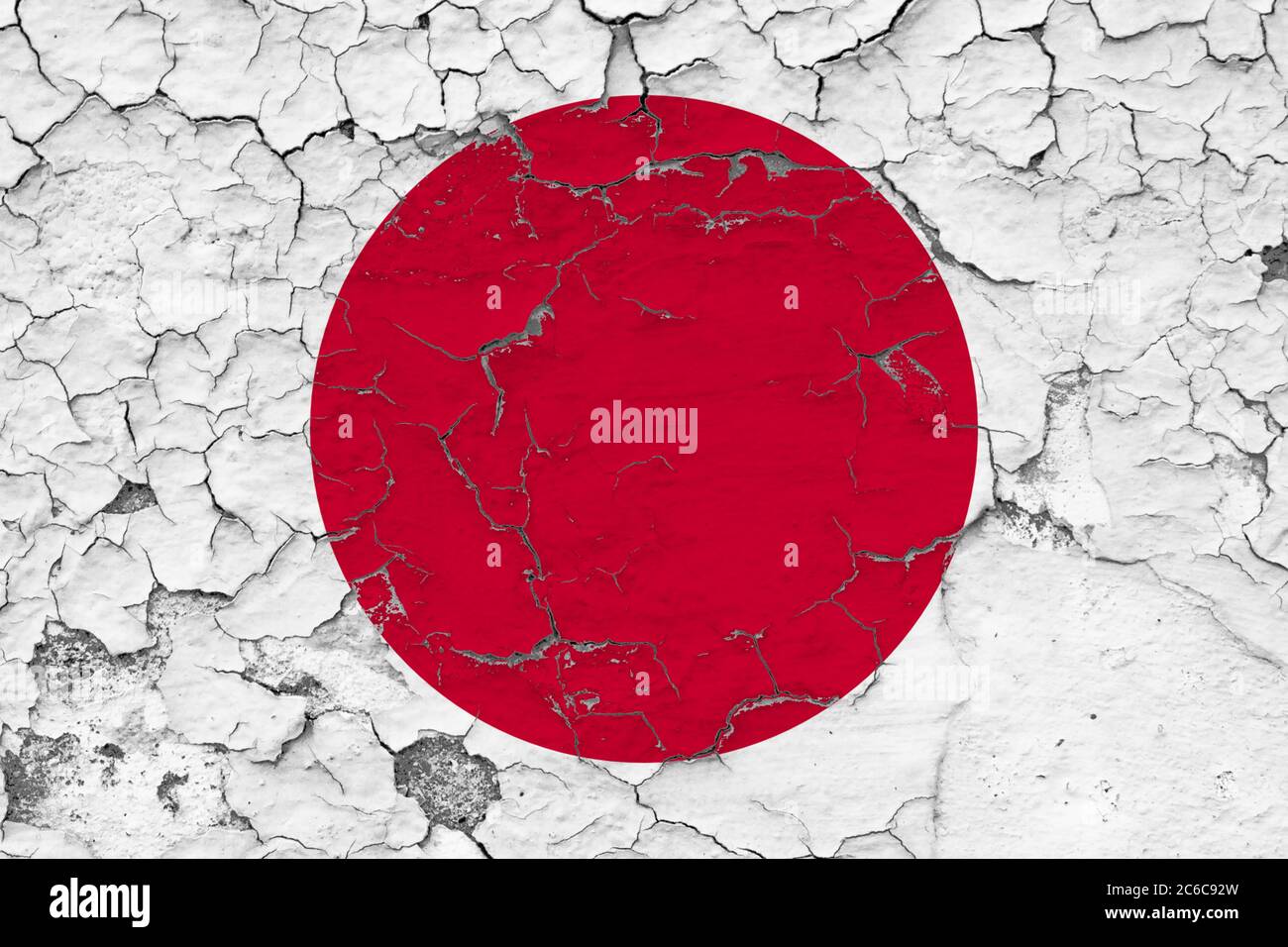 Japan flag close up grungy, damaged and weathered on wall peeling off ...