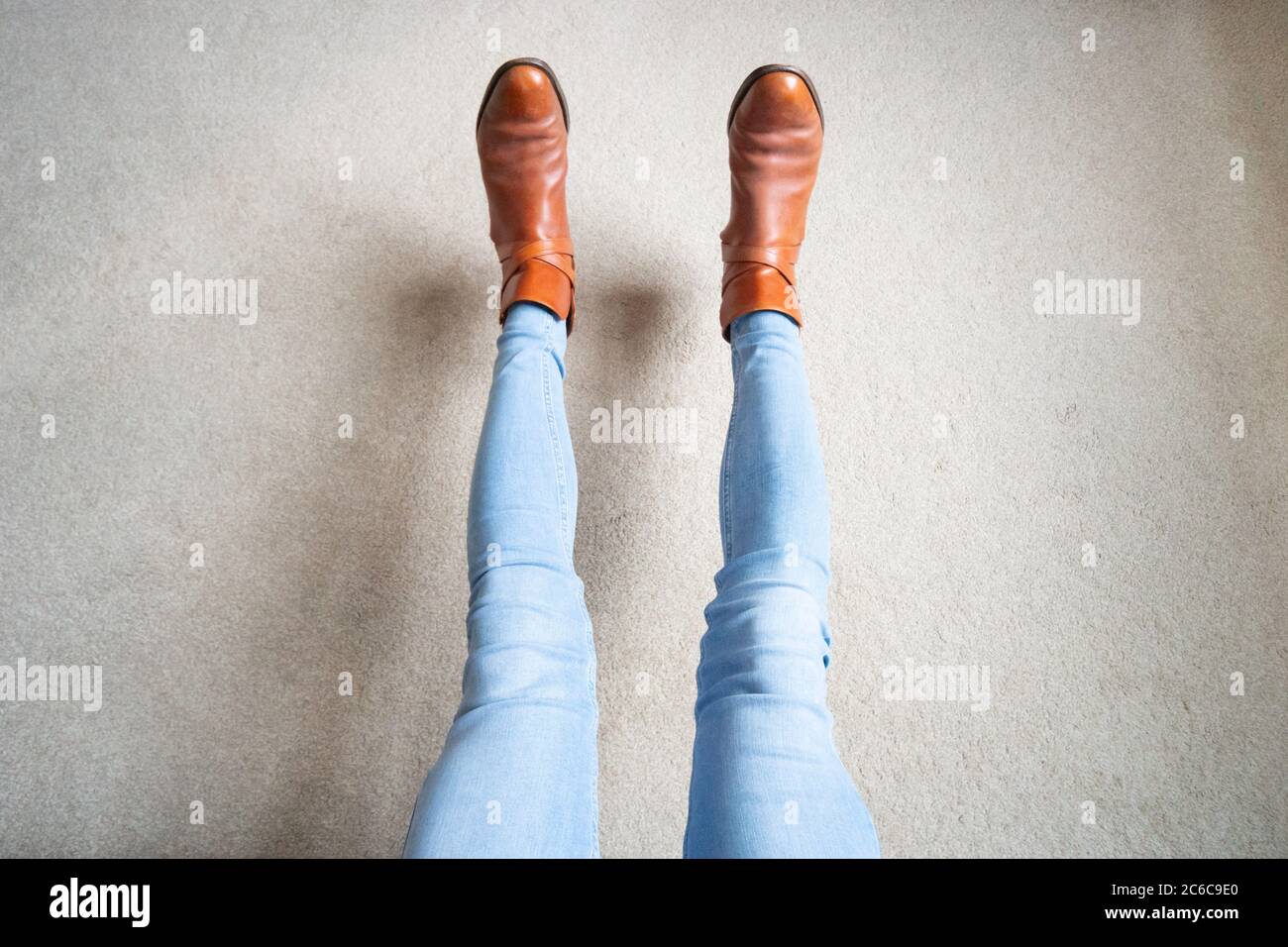 Feet legs jeans hi-res stock photography and images - Alamy