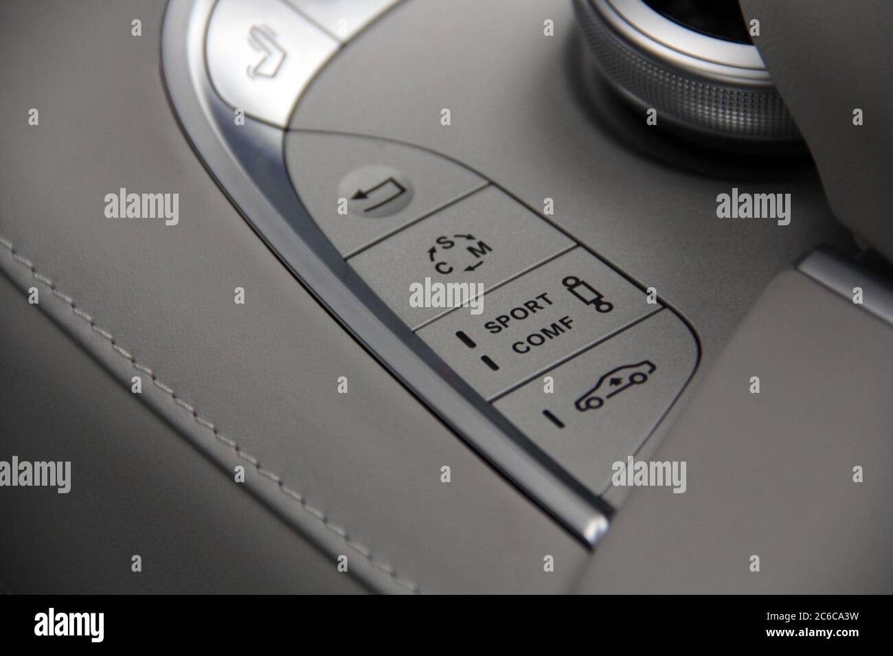 Suspension control for a modern passenger car in a button panel. Car ...