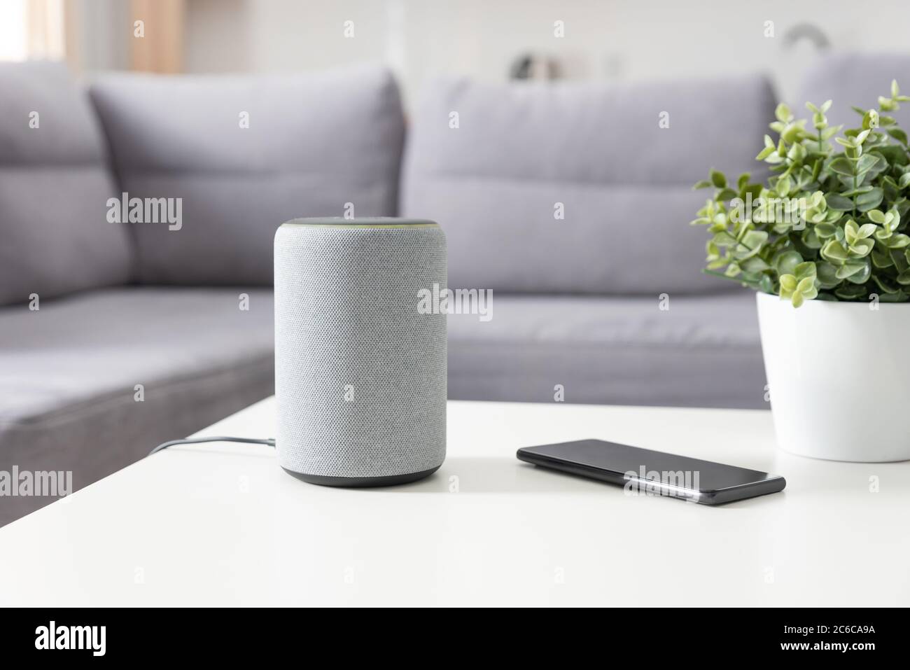Smart speaker device in living room. Intelligent assistant in smart ...