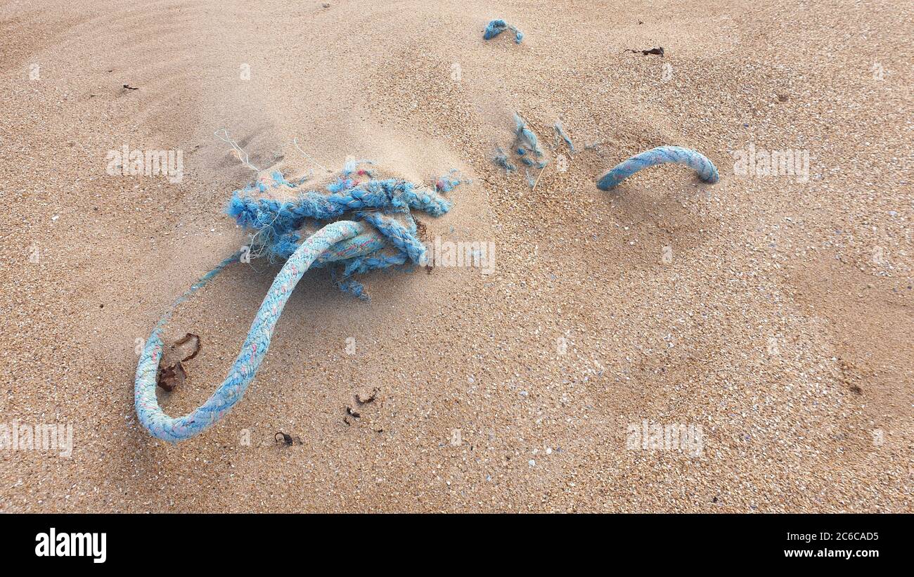 Rope Buried In Sand High Resolution Stock Photography and Images - Alamy