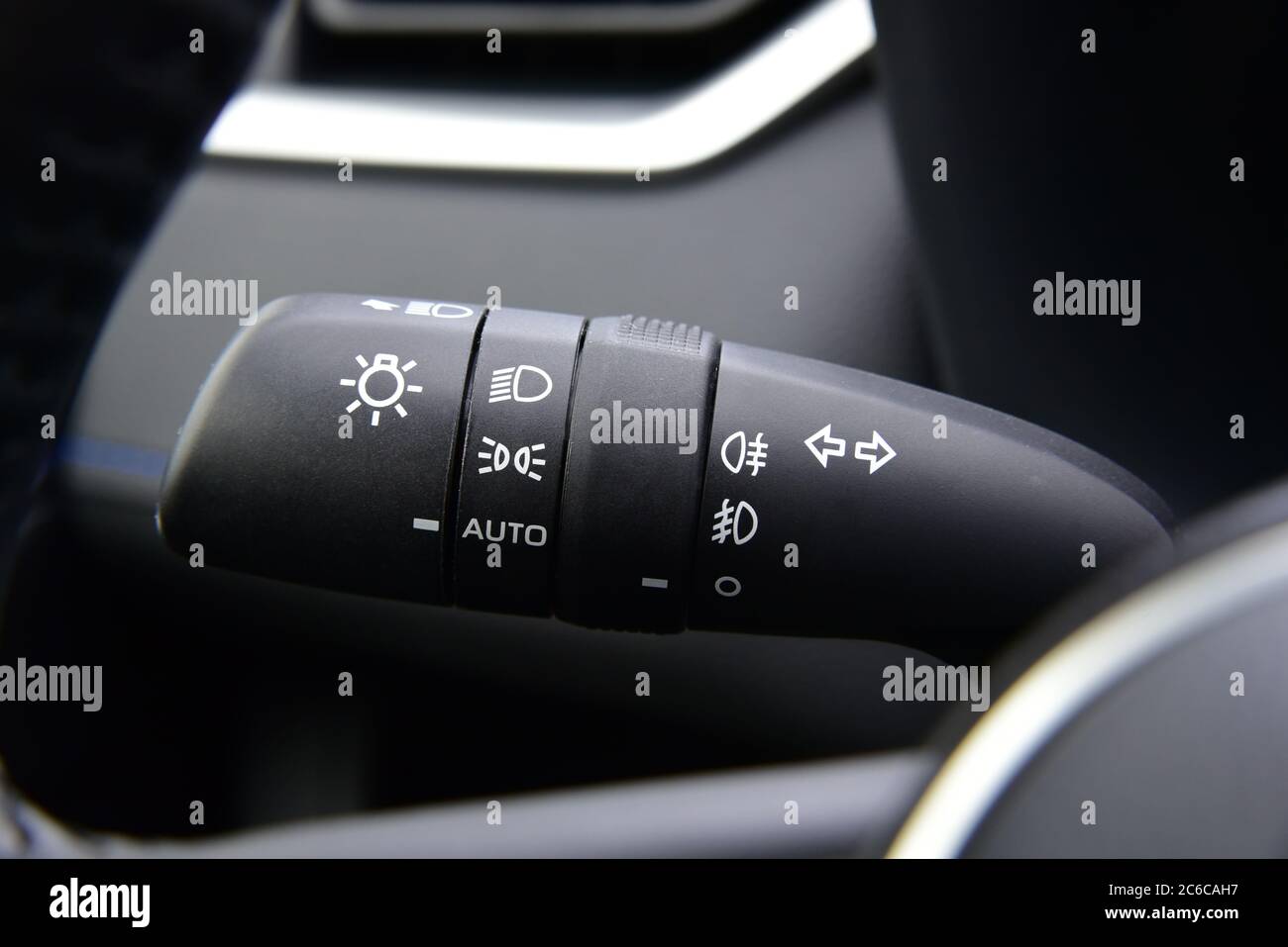 Switch for passenger car lights. Car lighting switch Stock Photo - Alamy