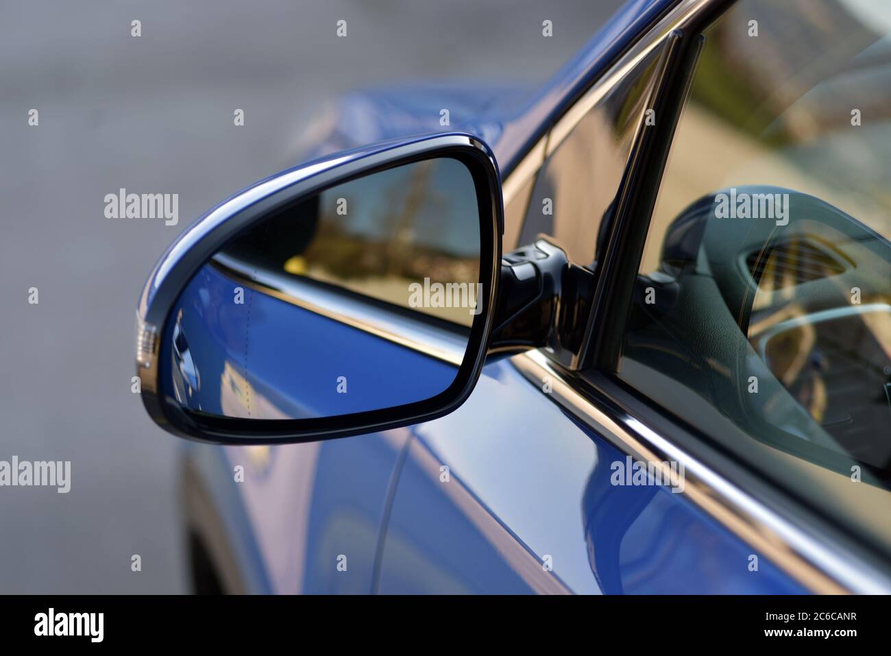 Side mirror with turn signal of a car Stock Photo - Alamy