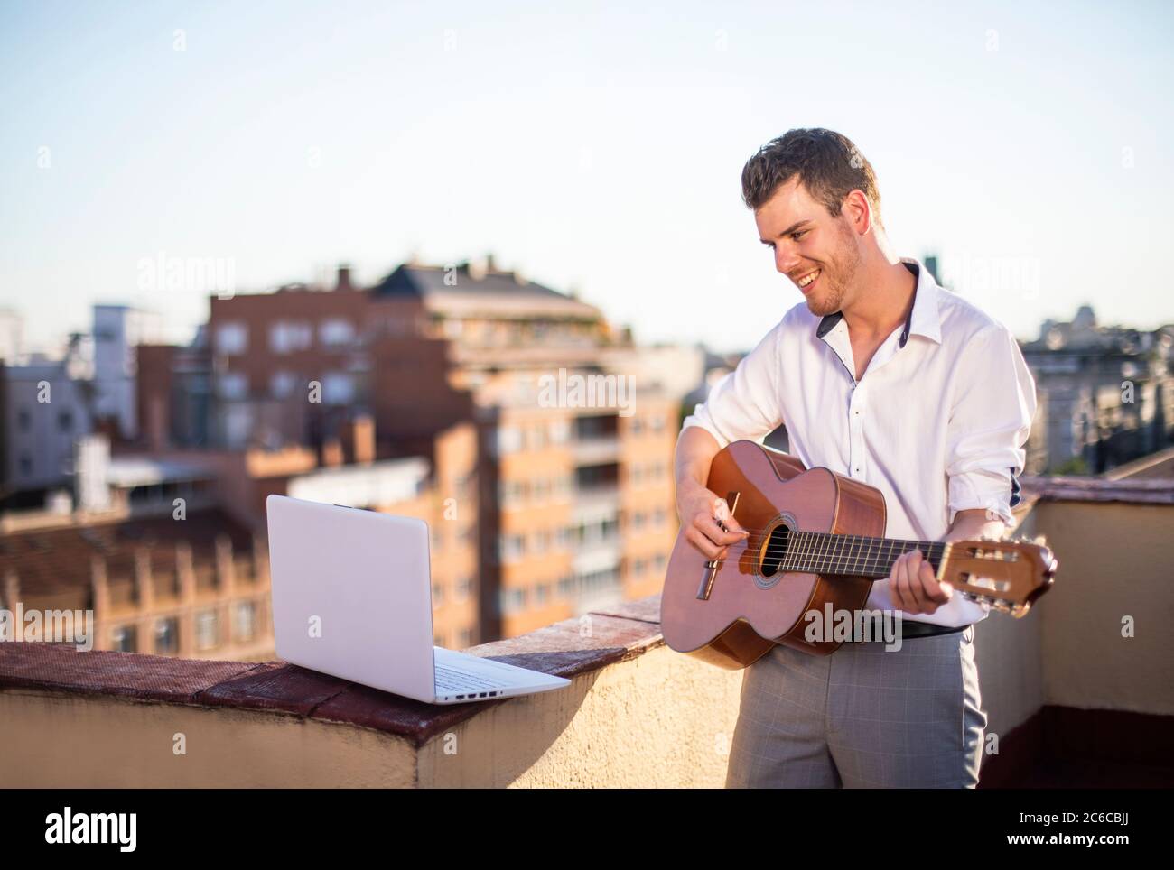 Man singing on roof hi-res stock photography and images - Alamy