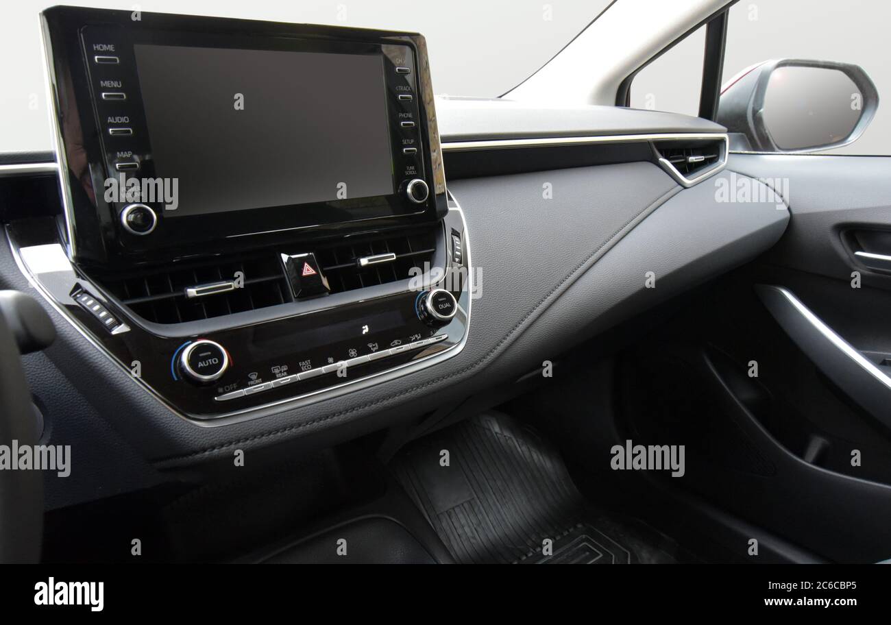 Screen multimedia system on dashboard in a modern car Stock Photo - Alamy