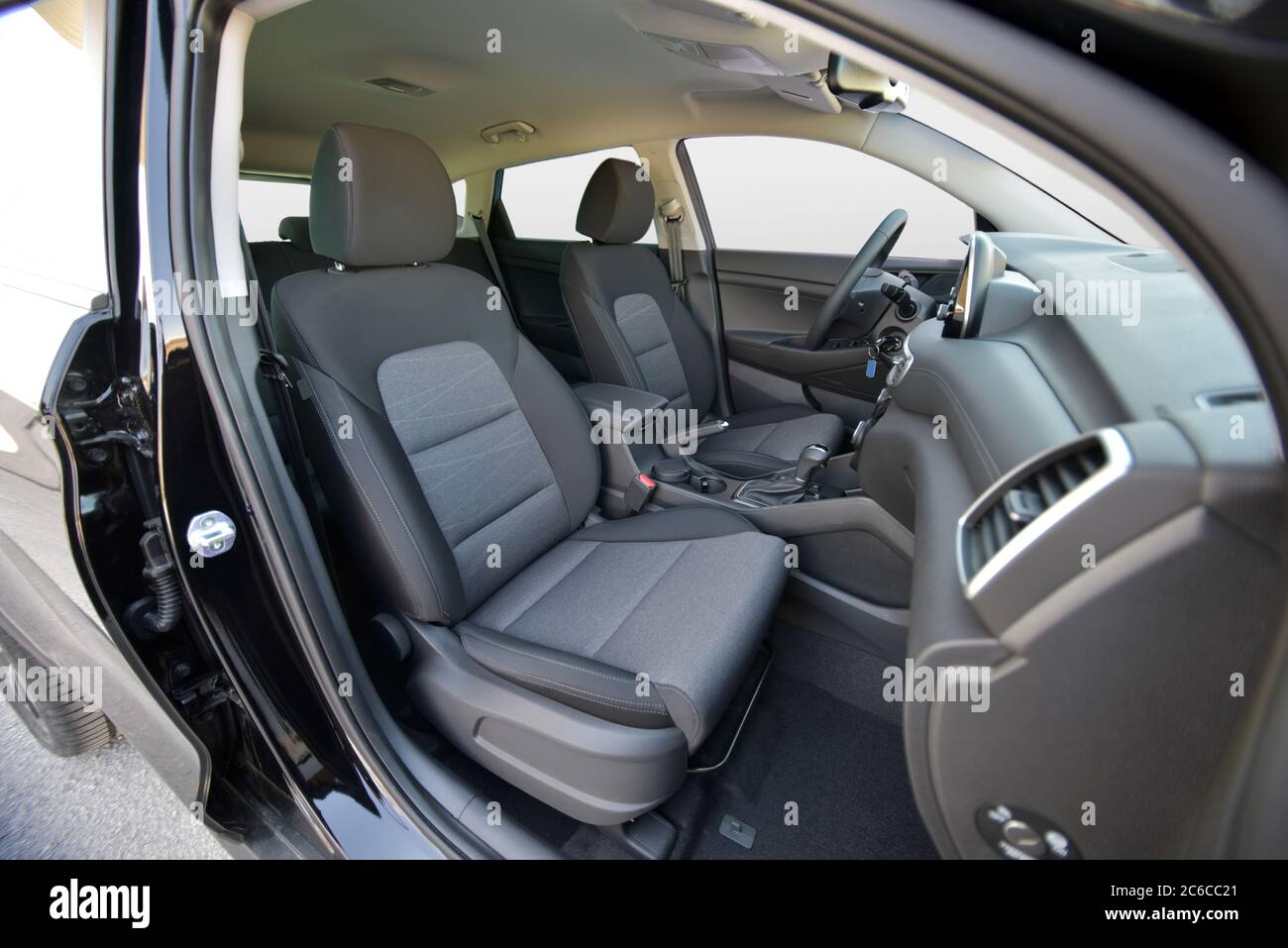 Front car seats. Front seats of a modern passenger car Stock Photo - Alamy