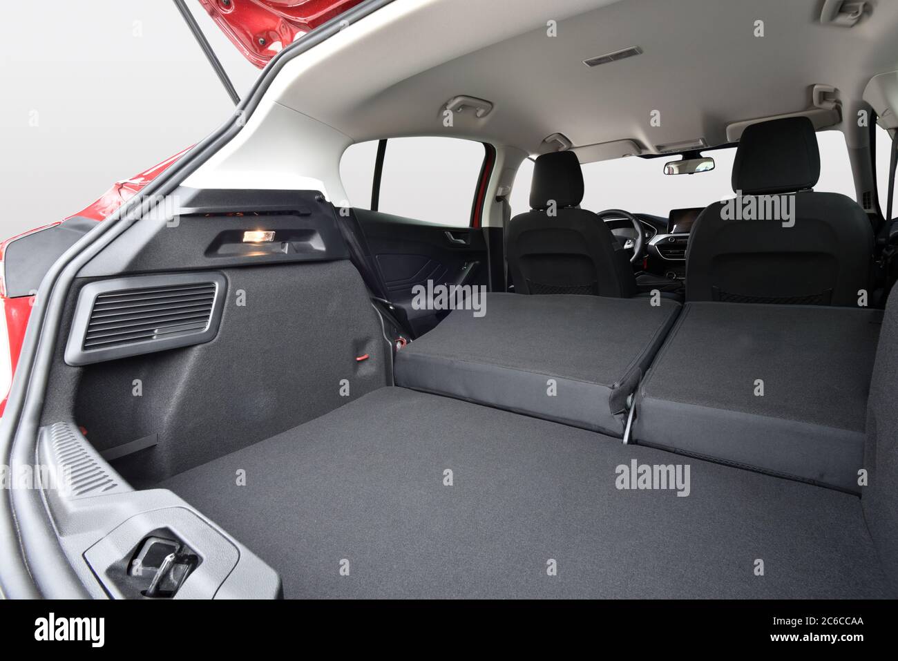 car trunk with rear seats folded Stock Photo - Alamy