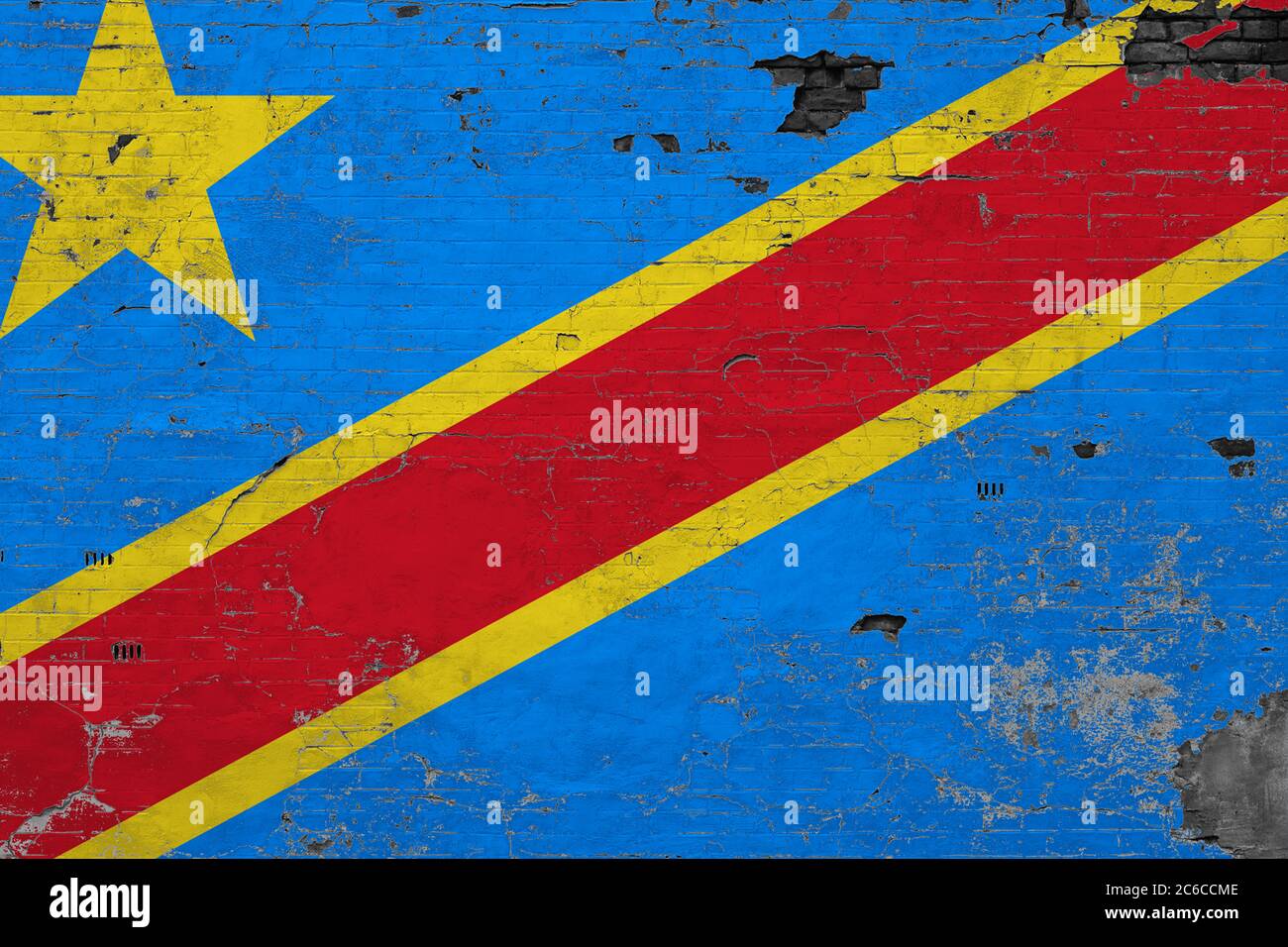 Congo flag on grunge scratched concrete surface. National vintage ...