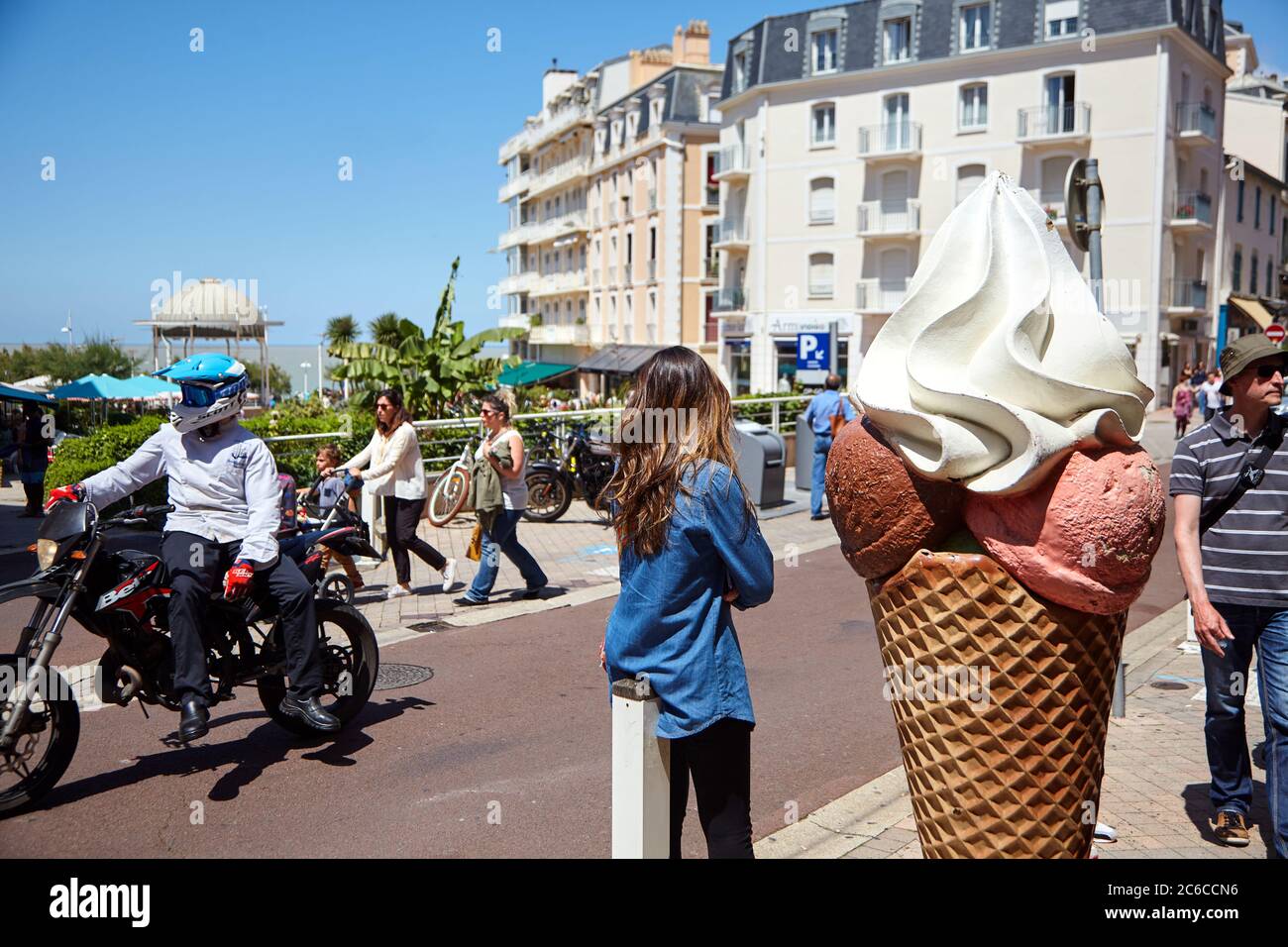 Biarritz, France - June 17, 2018: People on a city street near a big ...