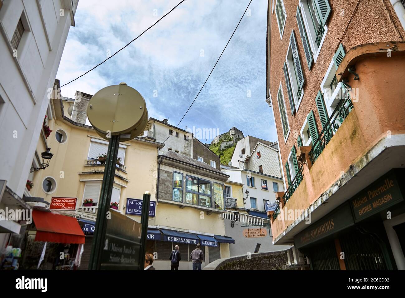 Lourdes, France - June 18, 2018: Facades of buildings on a narrow ...