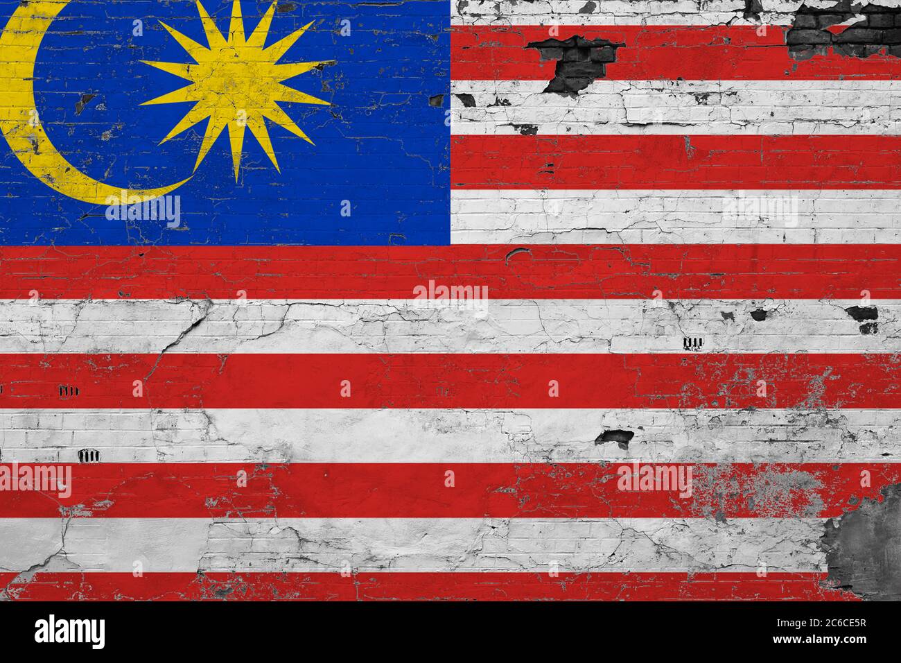 Malaysia flag on grunge scratched concrete surface. National vintage ...