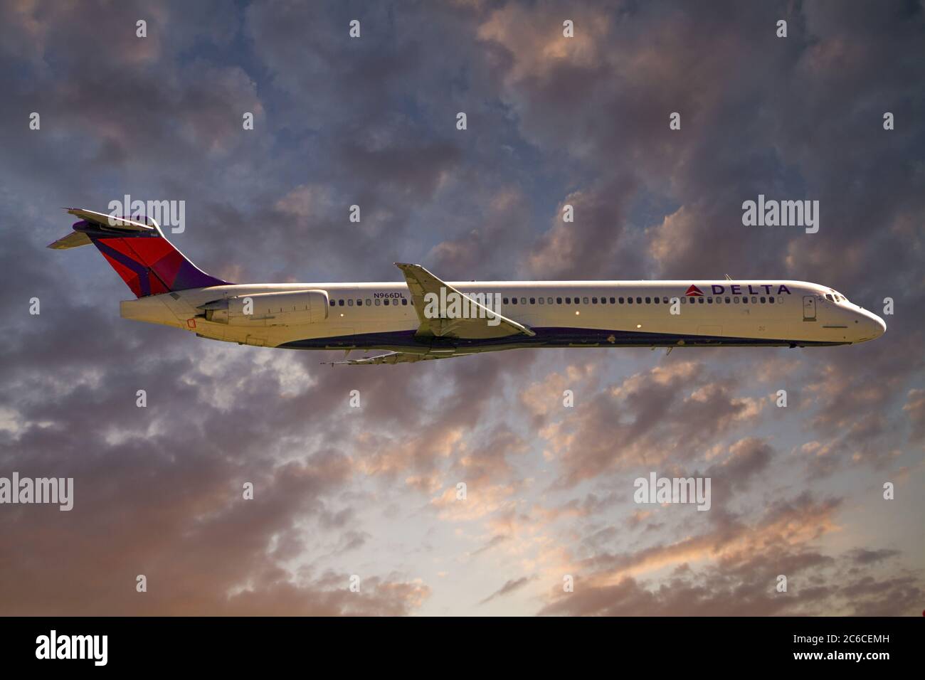 Delta Airlines MD-88 en-route at sunset over America on a scheduled ...