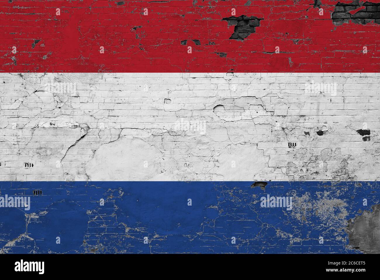 Netherlands flag on grunge scratched concrete surface. National vintage ...