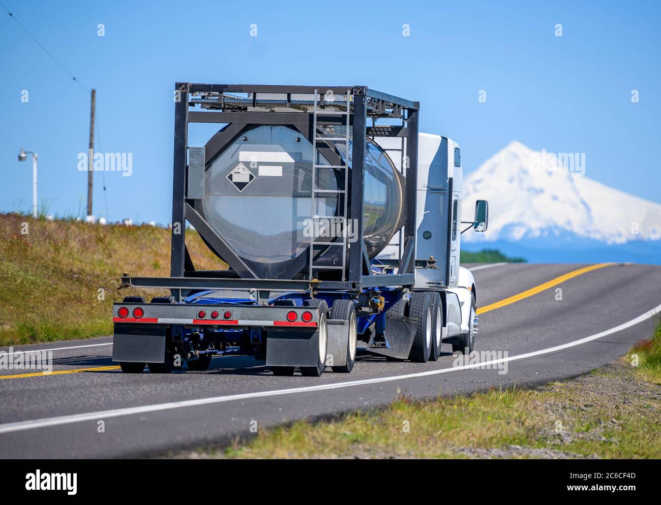 Big rig industrial grade diesel semi truck transporting danger ...